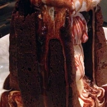 Rainforest Cafe - "Volcano" dessert, featuring three brownie slabs and ...